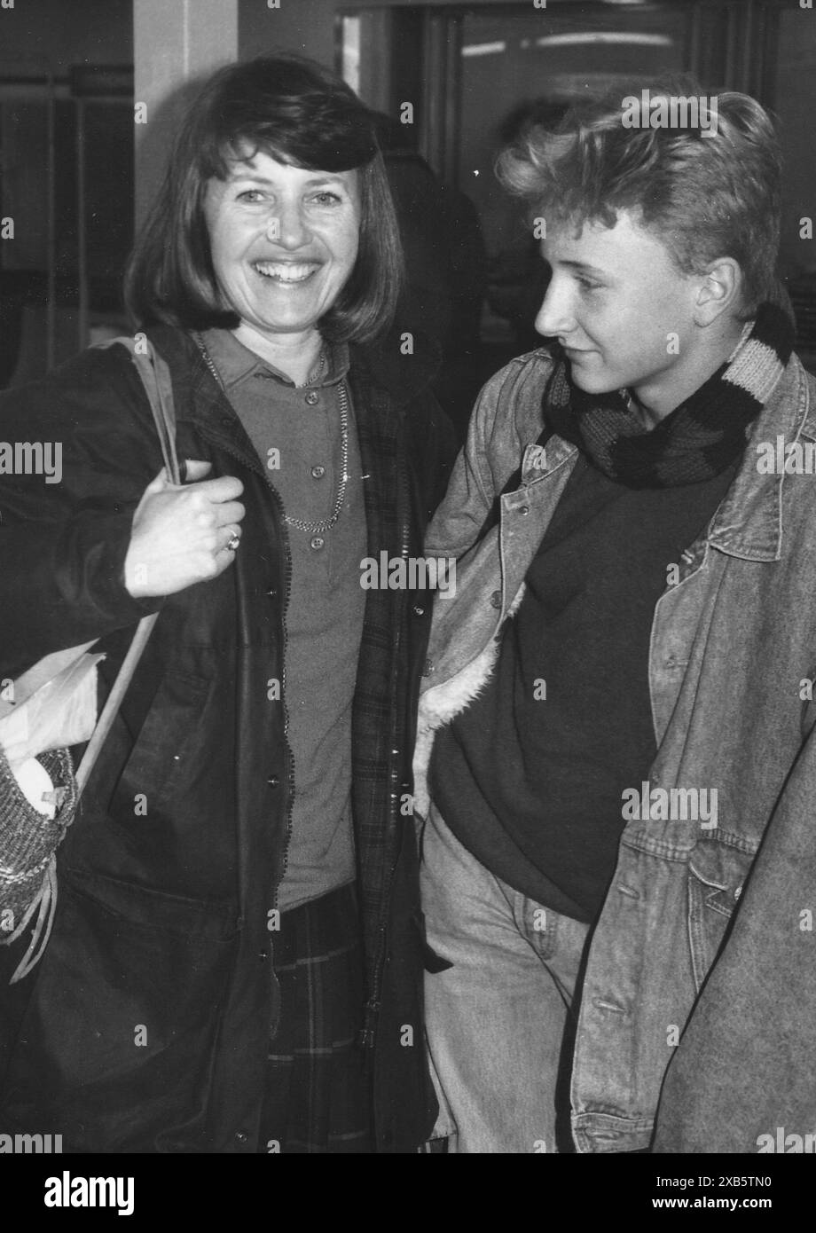 ELIZABETH HUGHES HUGS HER SON BEN AS THEY ARRIVE ABOARD THE BRITTANY ...