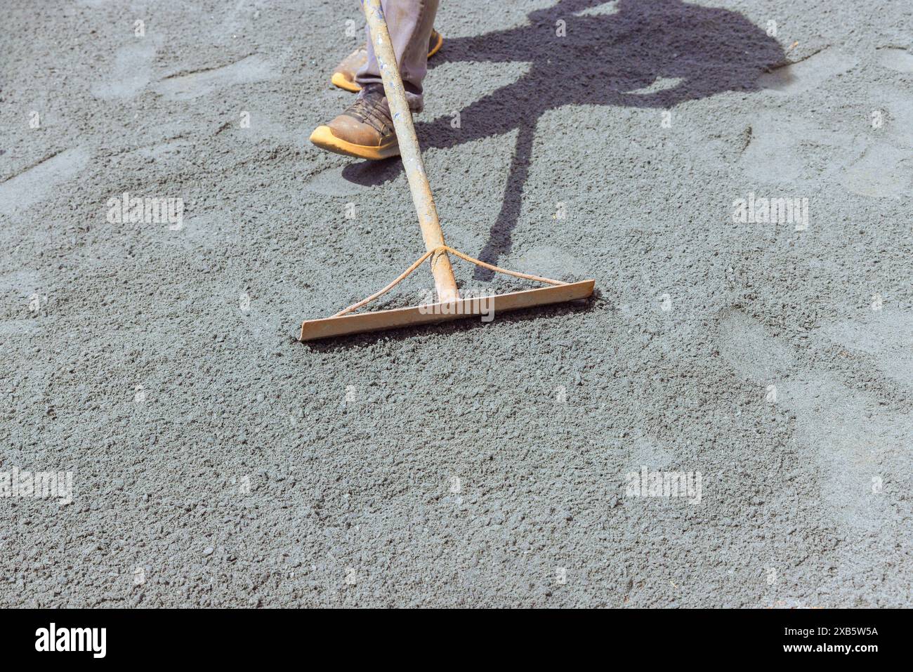 Ground is leveled, filled with fine gravel stones for pouring concrete ...