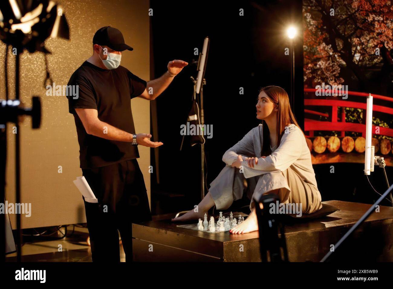 LATENCY, from left: director James Croke, Sasha Luss, on set, 2024 ...