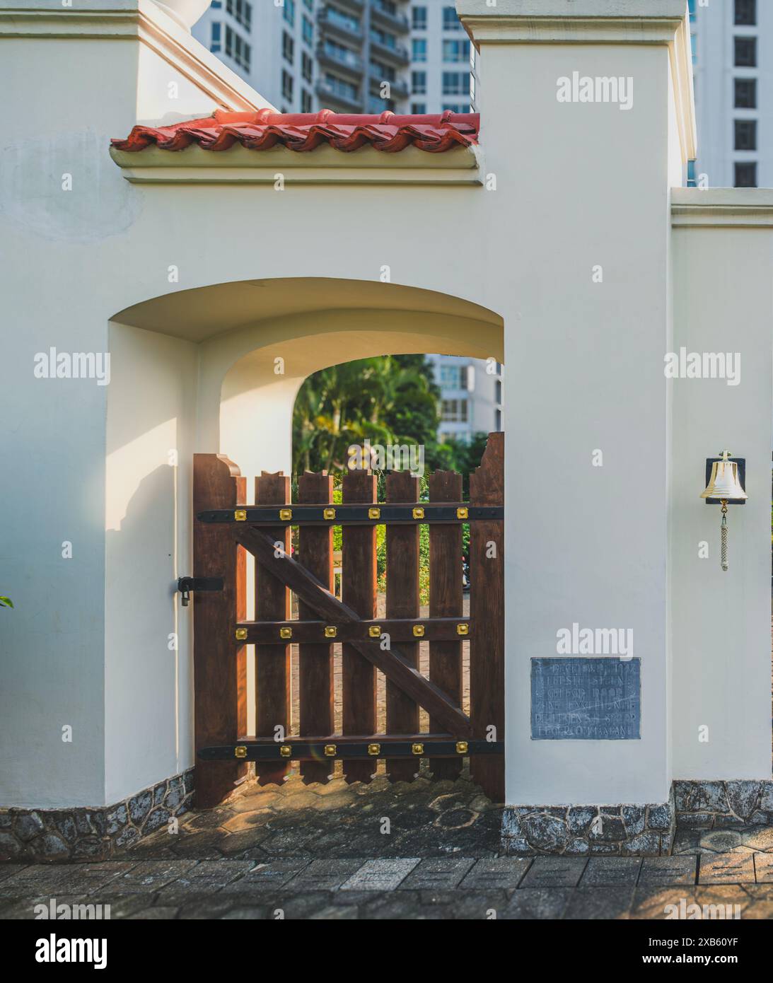 Jakarta, Indonesia - May 8th, 2024. a whitewashed entrance gate with a ...
