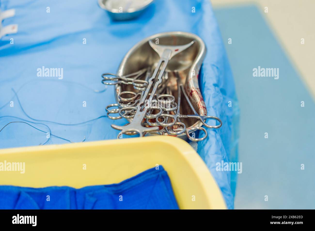Used medical instruments of a surgeon in the operating room during an ...