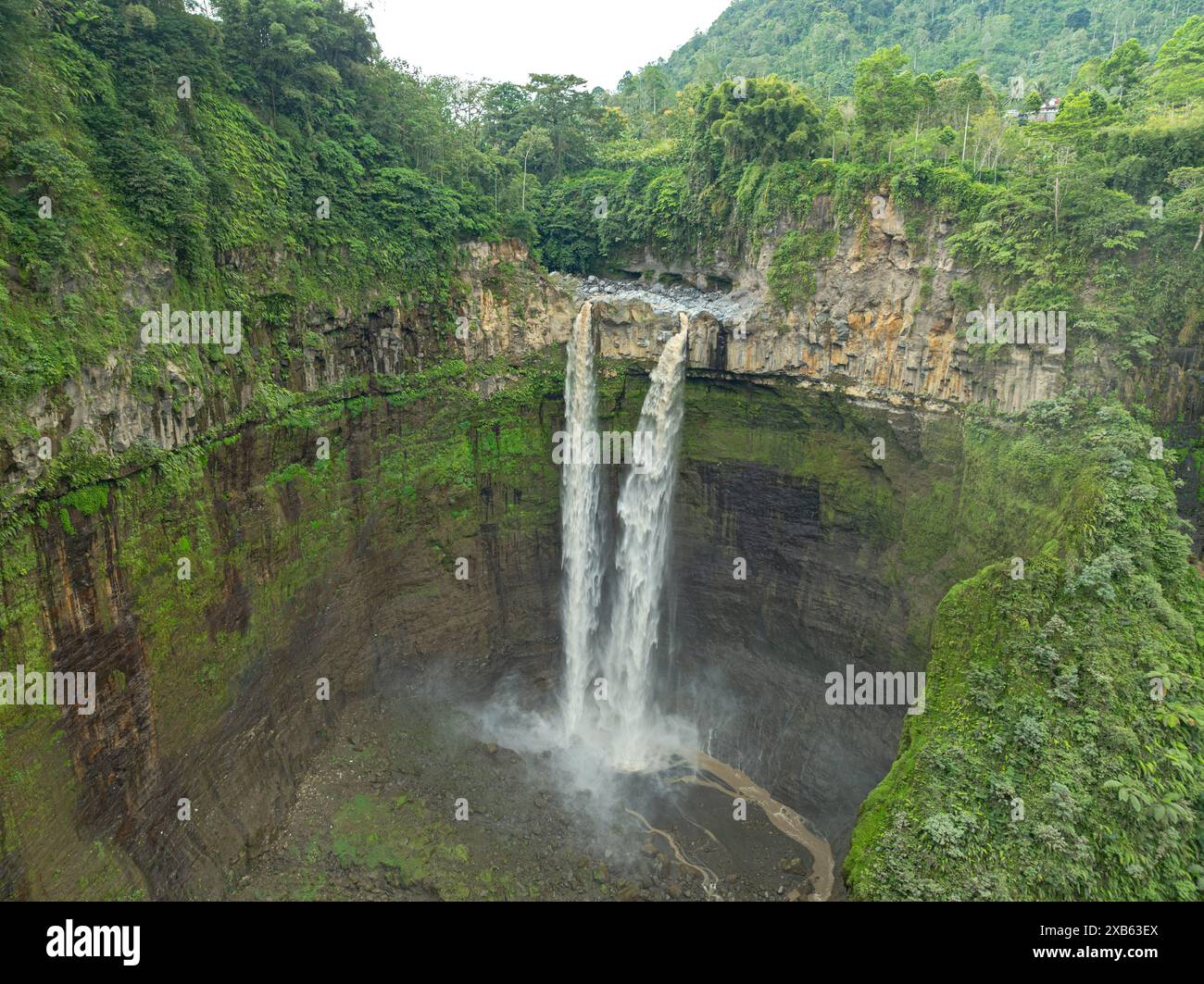 Aerial top view Coban Sriti Waterfall twin Waterfall stream that flows ...