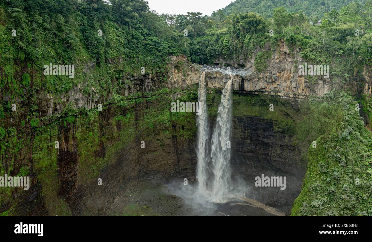 Aerial top view Coban Sriti Waterfall twin Waterfall stream that flows ...