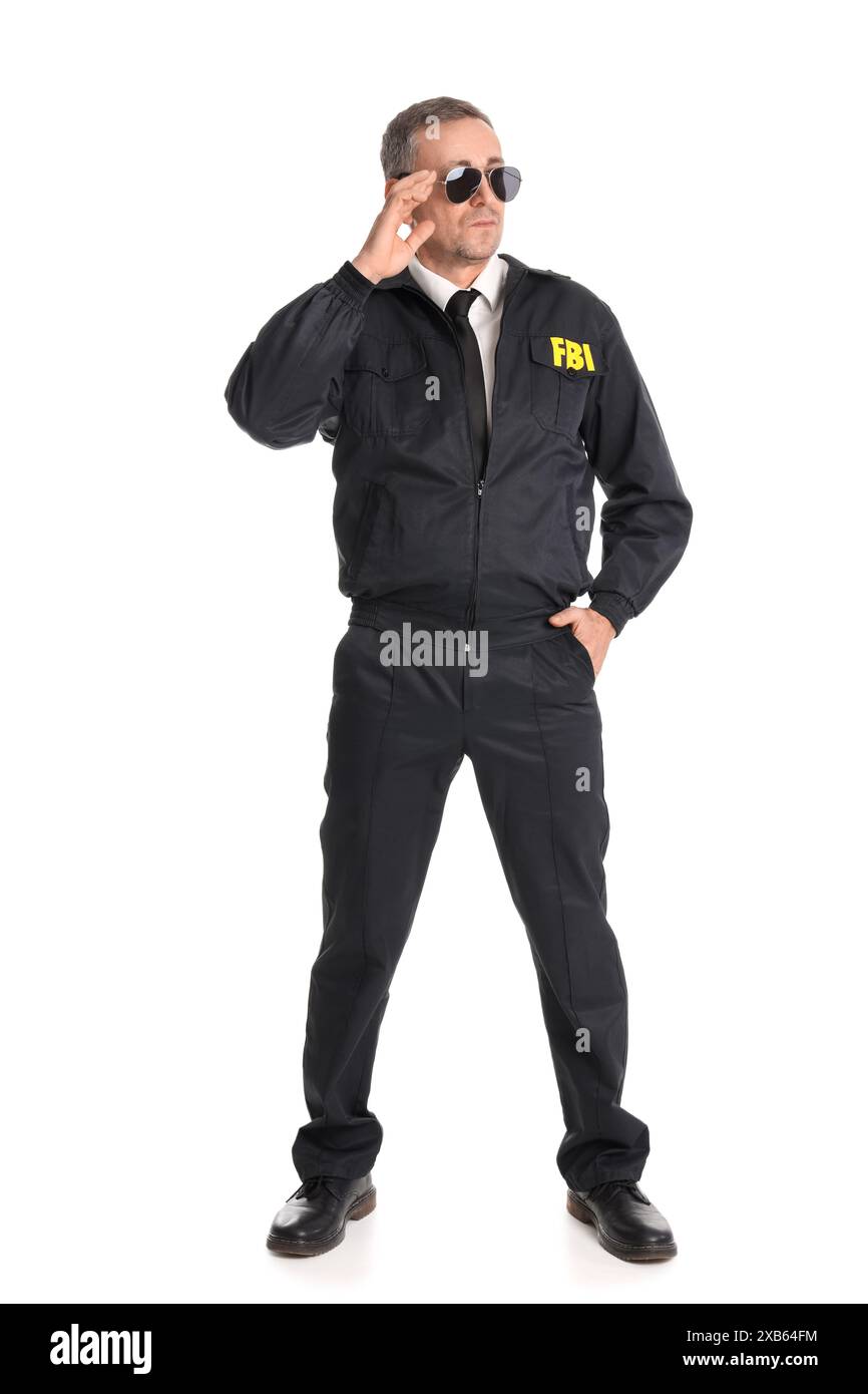 Mature FBI agent in sunglasses on white background Stock Photo - Alamy