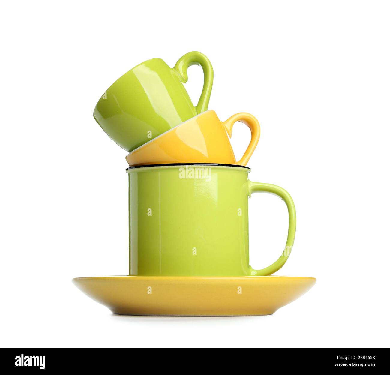 Set of clean cups on plate isolated on white background Stock Photo - Alamy