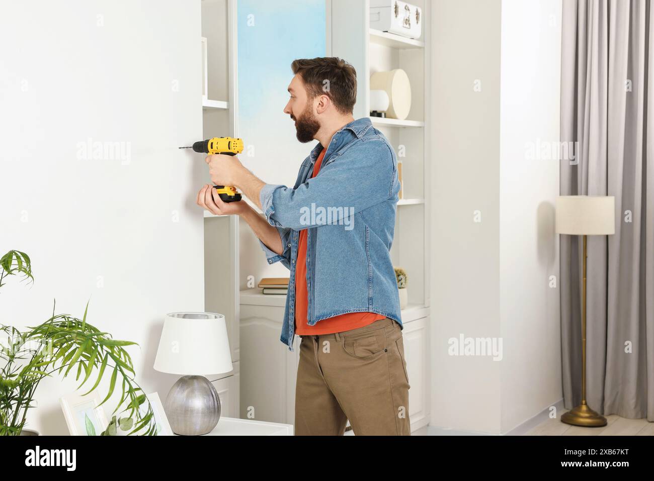 Drill the wall hi-res stock photography and images - Alamy