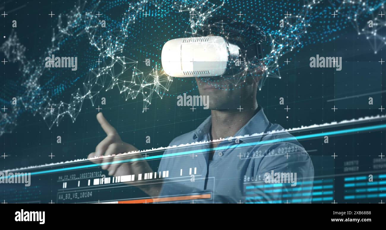 Middle-aged Caucasian man using virtual reality headset, interacting ...