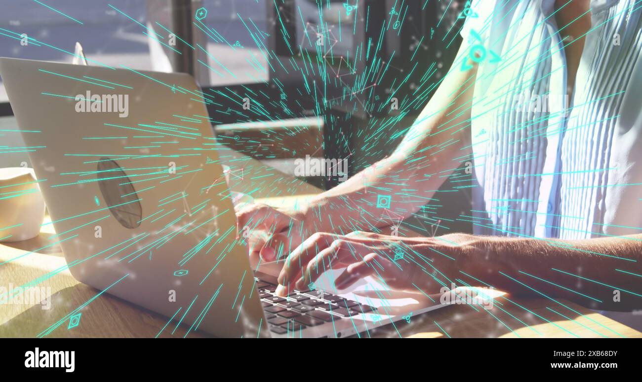 Caucasian woman typing on laptop with digital graphics overlay Stock Photo - Alamy