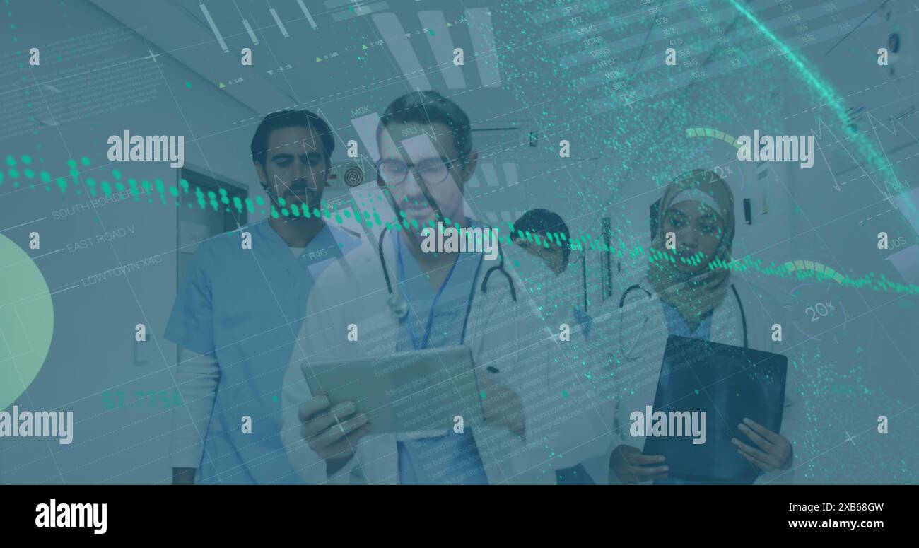 Medical professionals examining digital data hi-res stock photography ...