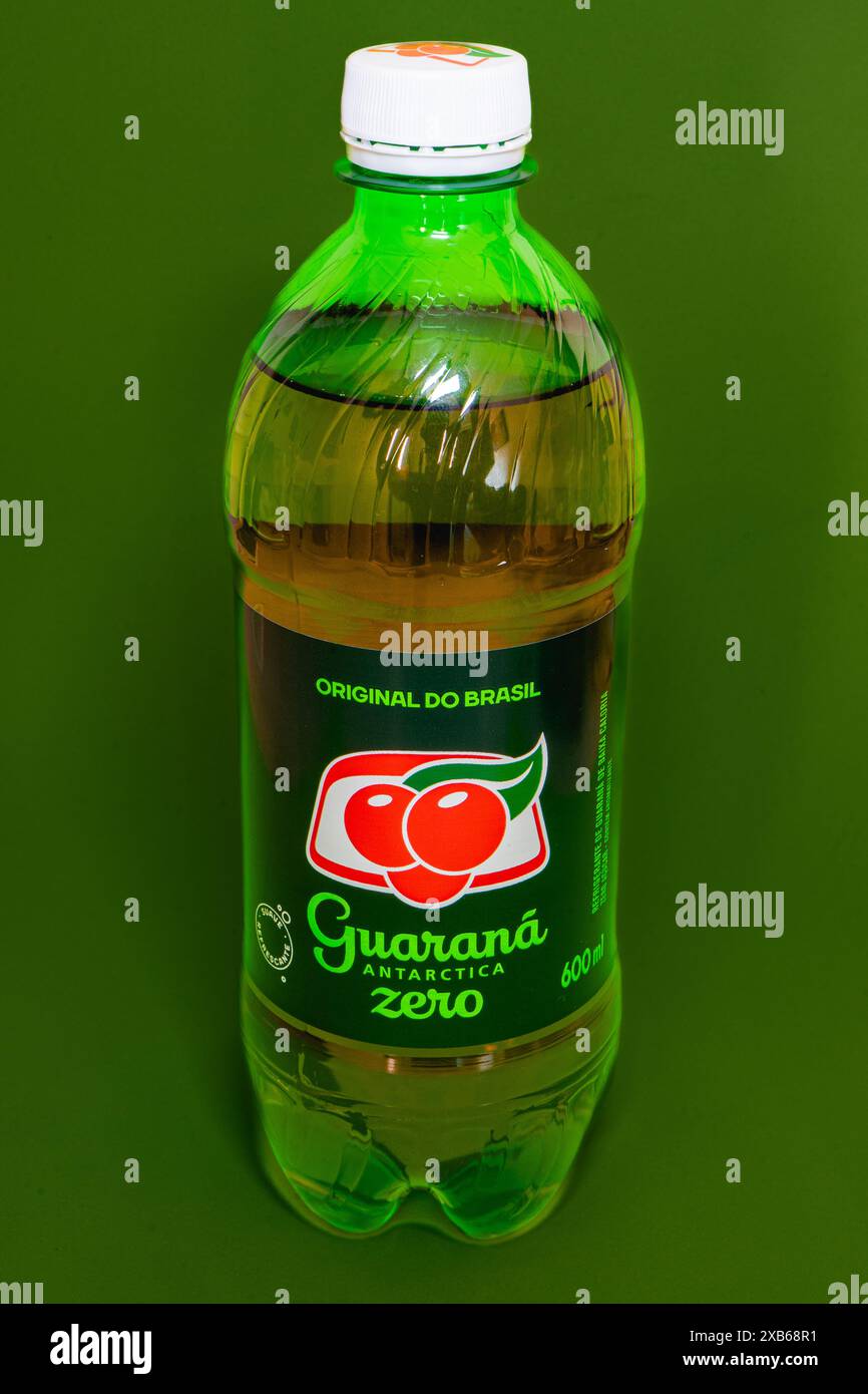 A bottle of Guarana Zero on a green background. June 4 2023. São Paulo ...
