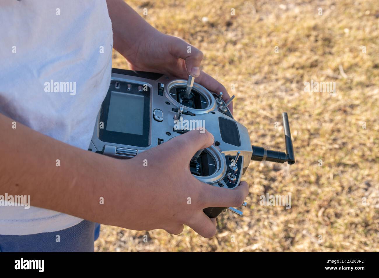 boy driving radio control Stock Photo - Alamy