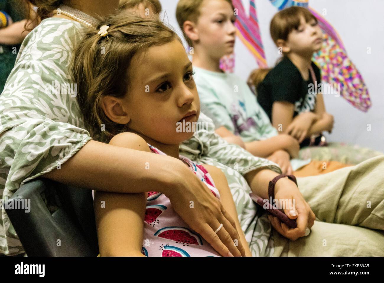 Kharkiv, Ukraine, June 10, 2024 Children attend a music concert of the ...