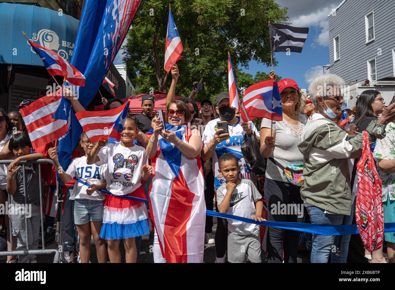 Spectators celebrate the 2024 Knickerbocker Avenue Puerto Rican Day ...