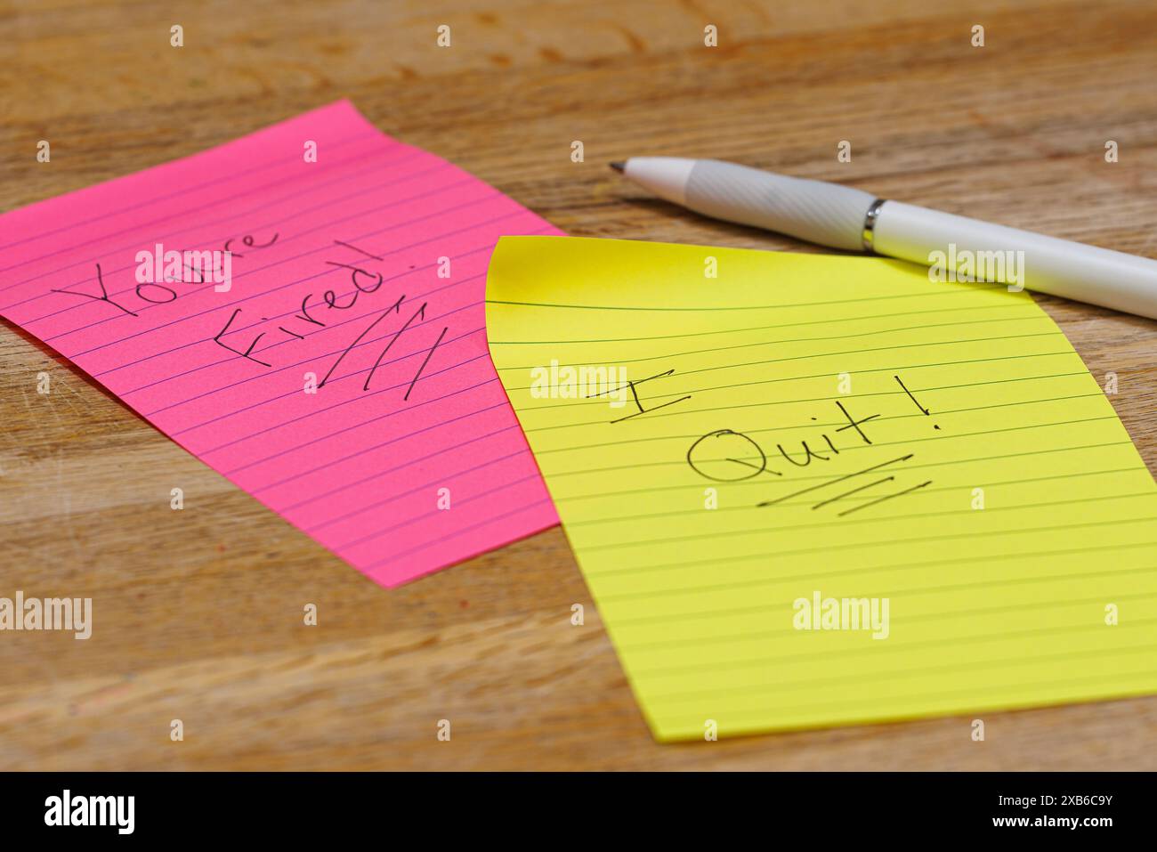 Layered Handwritten Notes Saying "You're Fired" and "I Quit Stock Photo ...