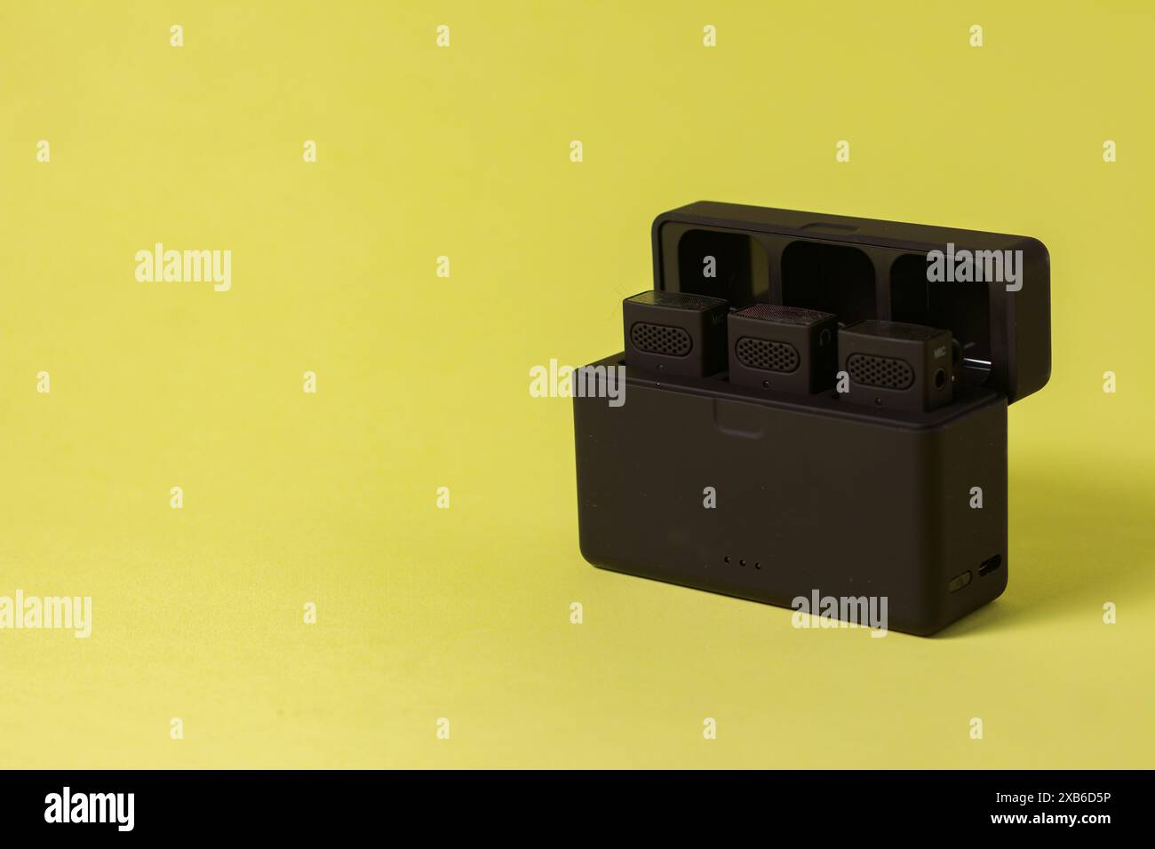 Black mini wireless mic, simple and flexible. commonly used by content ...