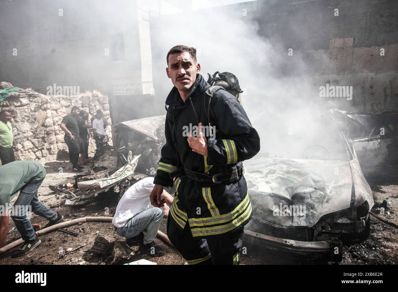 Tubas, Palestine. 10th June, 2024. Firefighters extinguish the burning ...