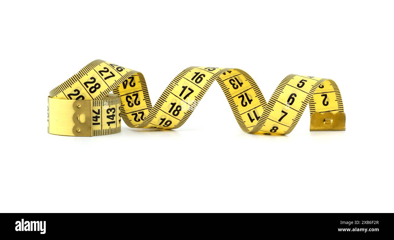 Yellow tape measure spirals creates a visual impression of motion ...