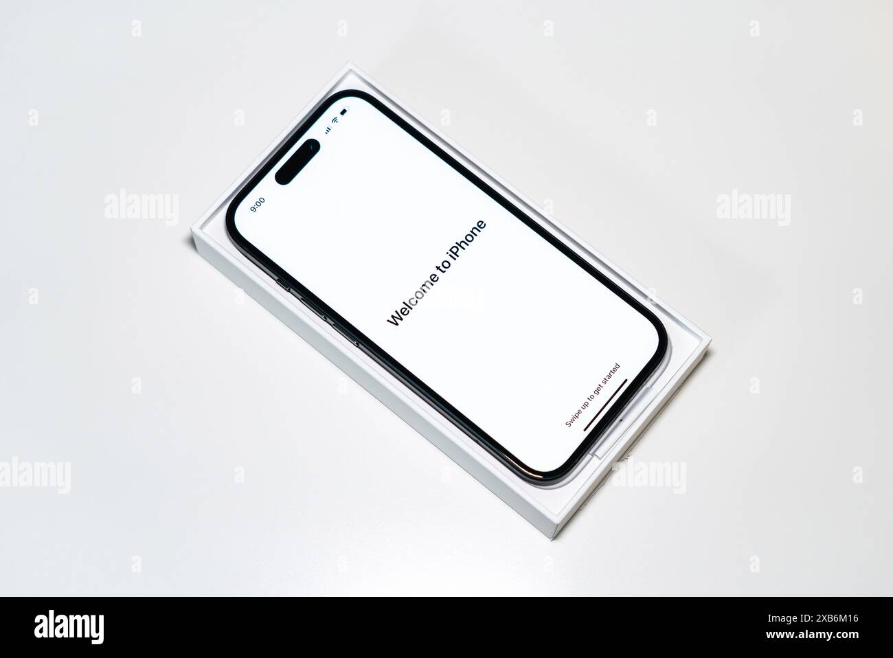 A brand new Apple iPhone 15 with Welcome to iPhone on the display ...