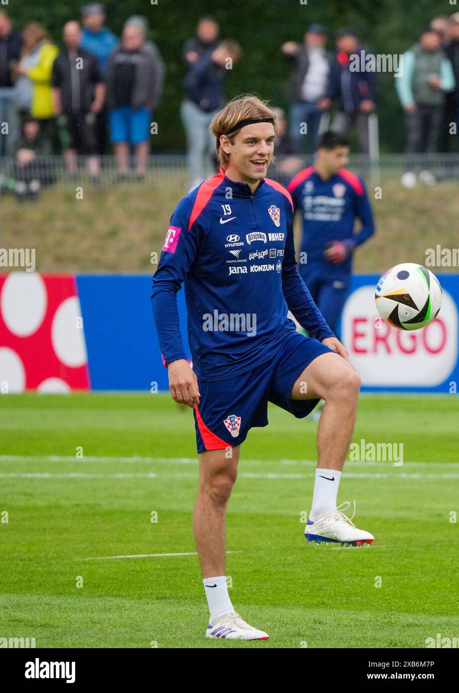 Neuruppin, Germany. 10th June, 2024. Croatia's Borna Sosa trains at the ...