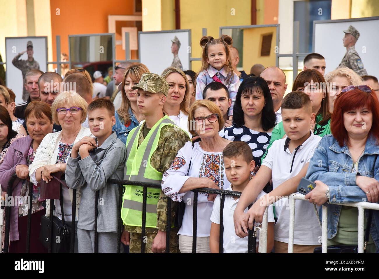 Relatives watch the graduation ceremony of cadets of the Lyceum named ...