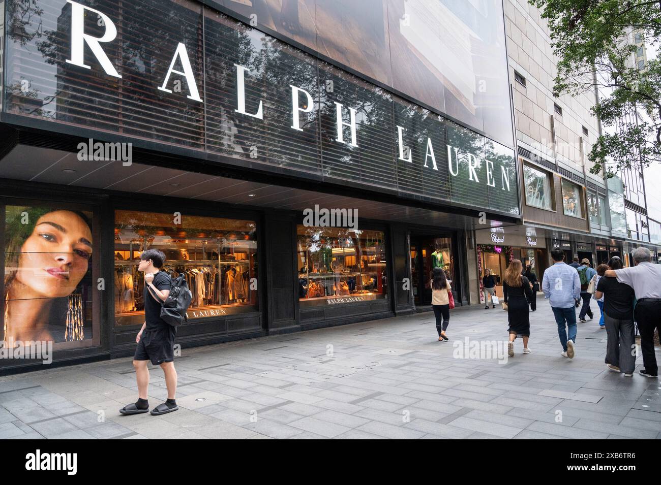 Hong Kong, China. 3rd May, 2024. Pedestrians walk past the American ...
