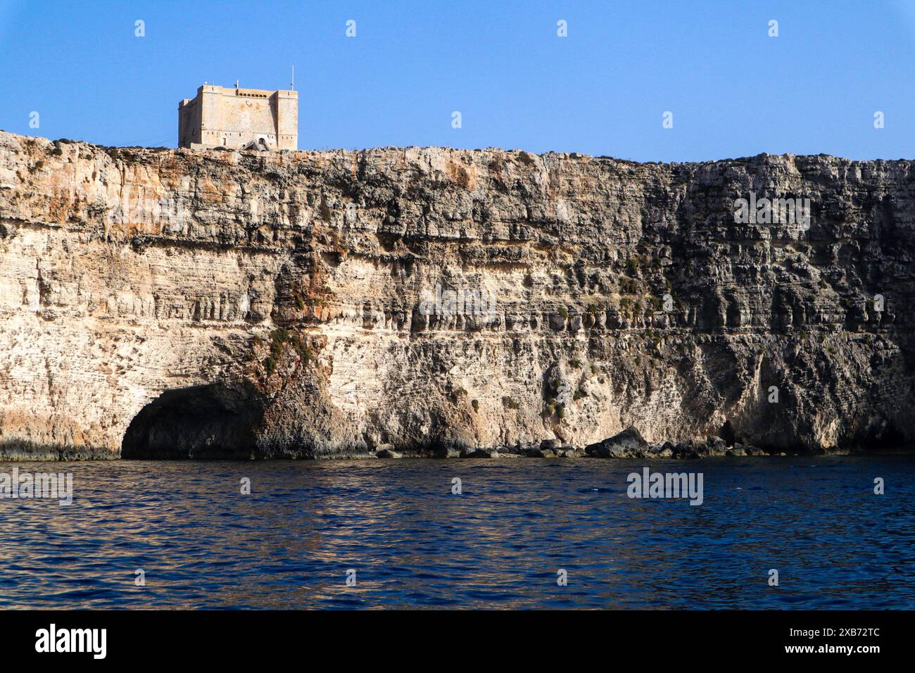 See cave & fort in Gozo Stock Photo - Alamy