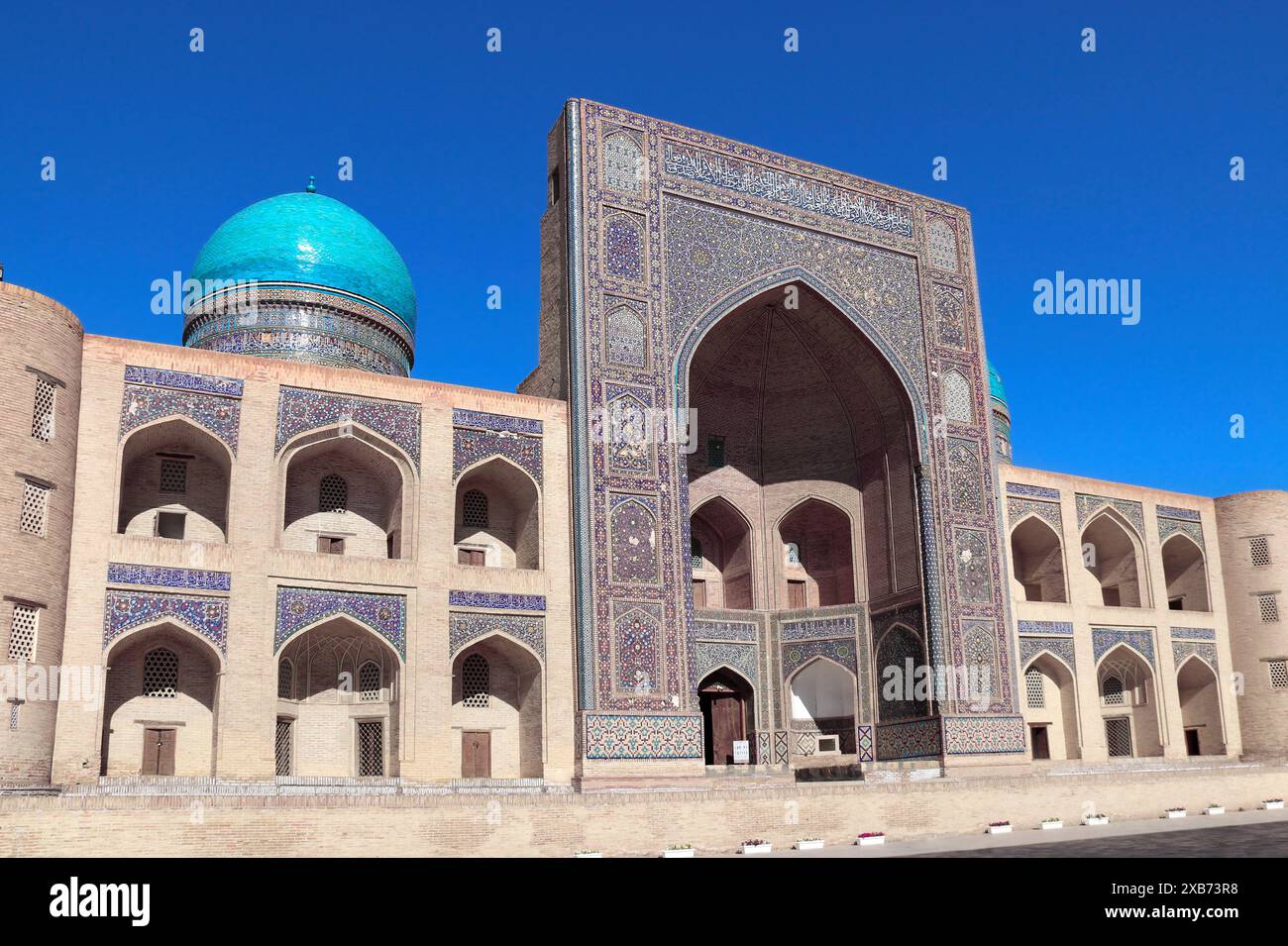 Facade of Mir i Arab madrassa, Bukhara, Uzbekistan. Madrasah Mir Arab, Poi-Kalyan (Poi Kalon ...