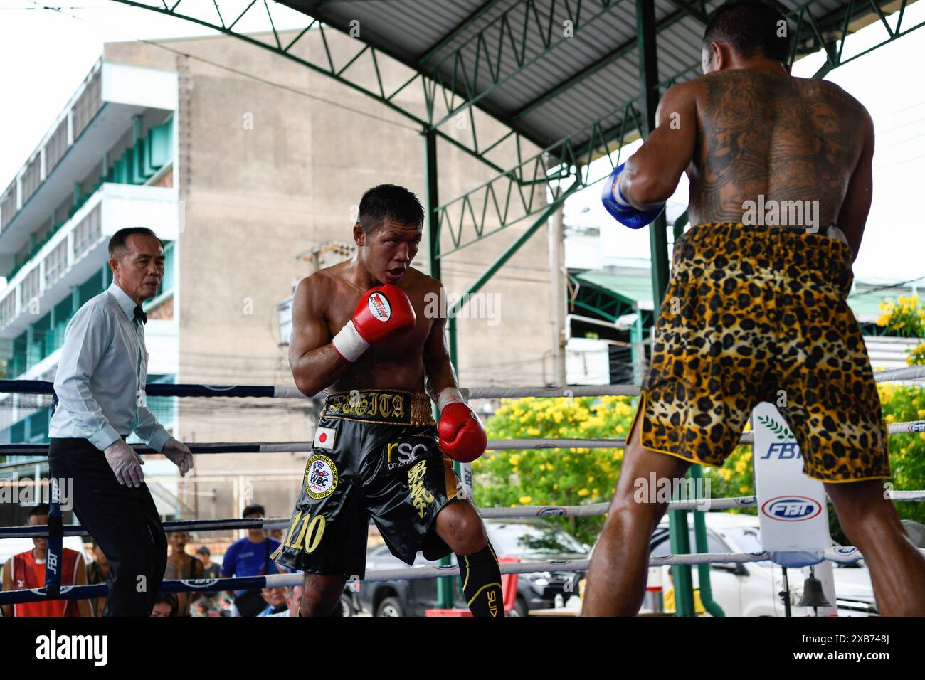 Bangkok, Thailand. 10th June, 2024. Daisuke Sugita (L) and Wira Mikham(R) in action during a WBC ...