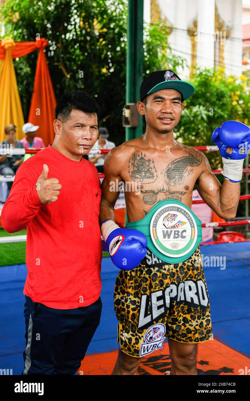 Bangkok, Thailand. 10th June, 2024. Wira Mikham (R) and his trainer (L ...