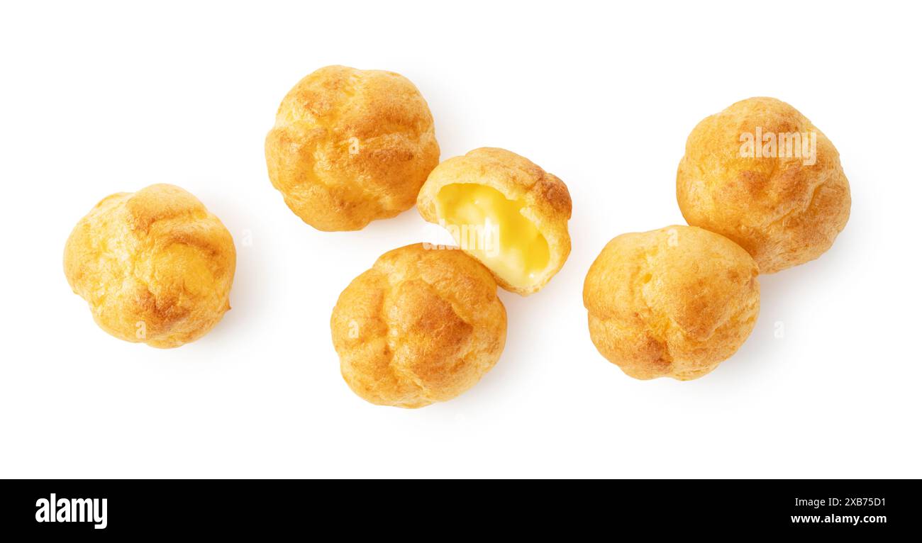 Multiple cream puffs placed on a white background. View from directly ...