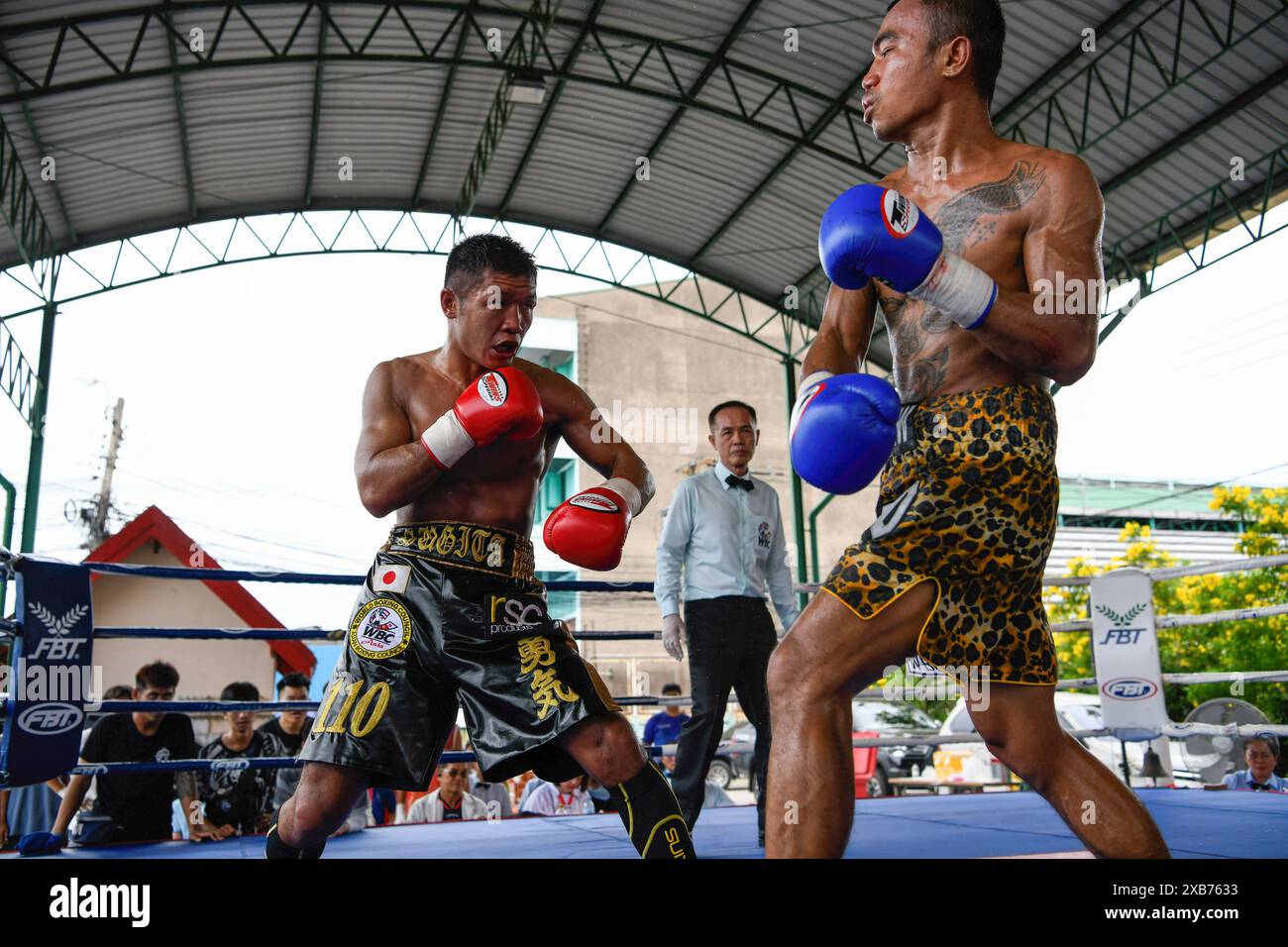 Bangkok, Thailand. 10th June, 2024. Daisuke Sugita (L) and Wira Mikham(R) in action during a WBC ...
