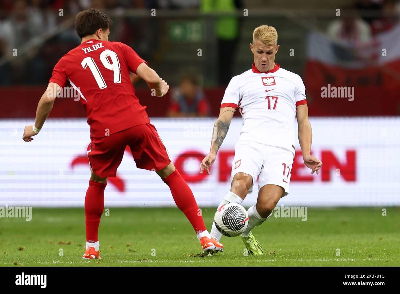 Kenan Yildiz of Turkiye and Damian Szymanski of Poland during the ...