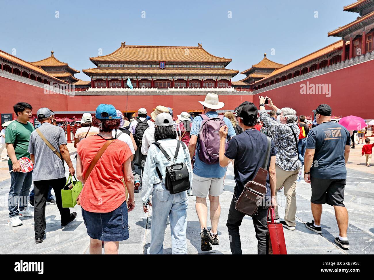 Tourists visit the Palace Museum amid hot weather in Beijing, China, 8 ...
