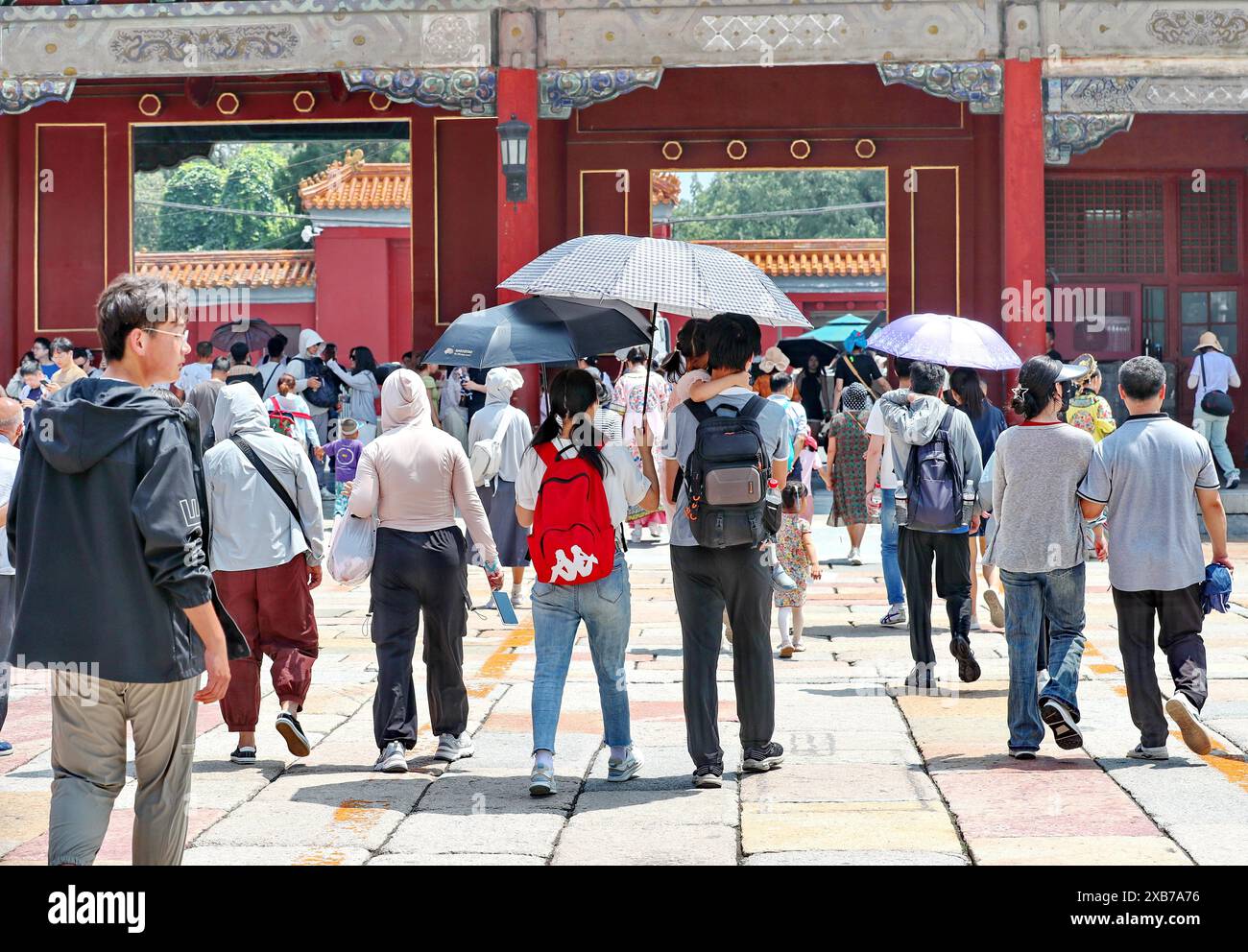 Tourists visit the Palace Museum amid hot weather in Beijing, China, 8 ...