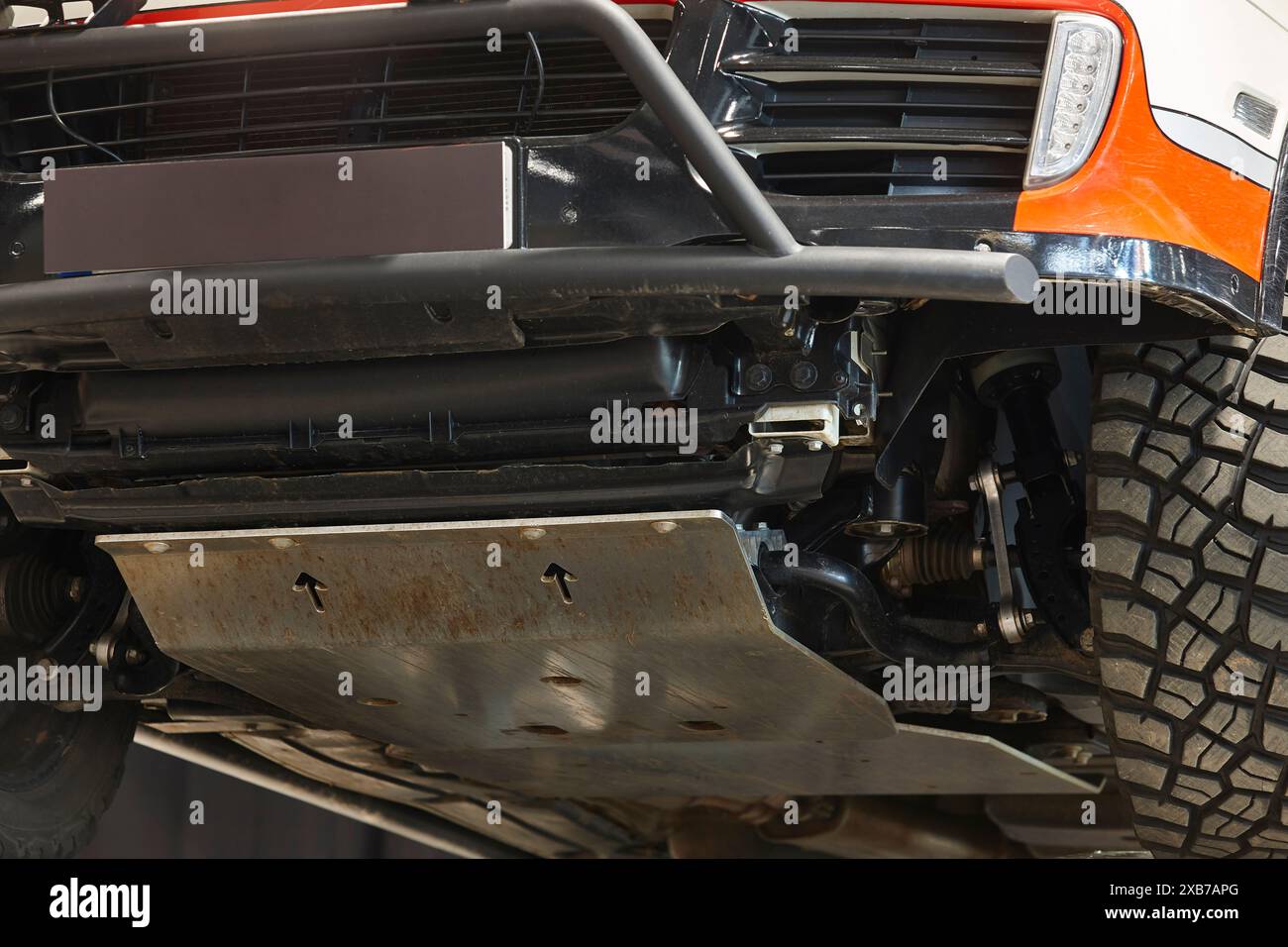 All terrain car tire detail fron below. Off road driving Stock Photo ...