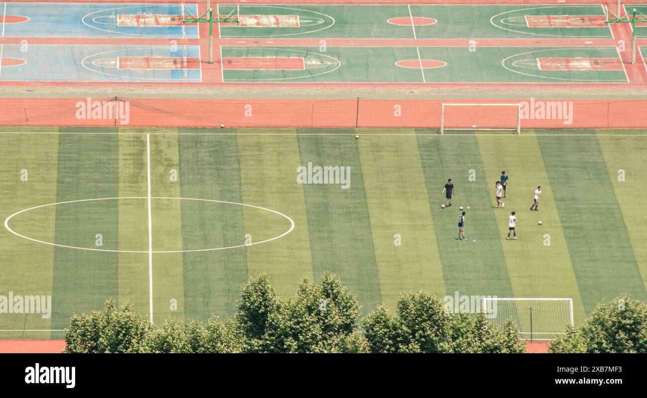 University students jumping on campus hi-res stock photography and ...