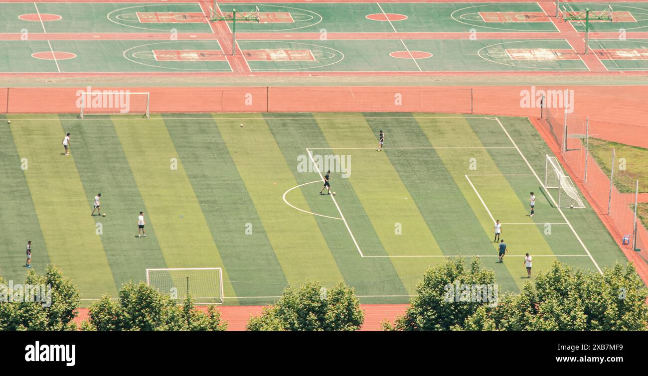 University students jumping on campus hi-res stock photography and ...