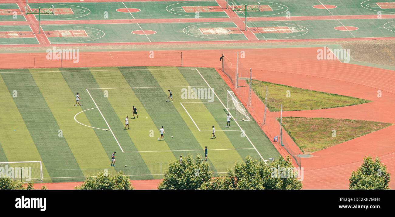 University students jumping on campus hi-res stock photography and ...
