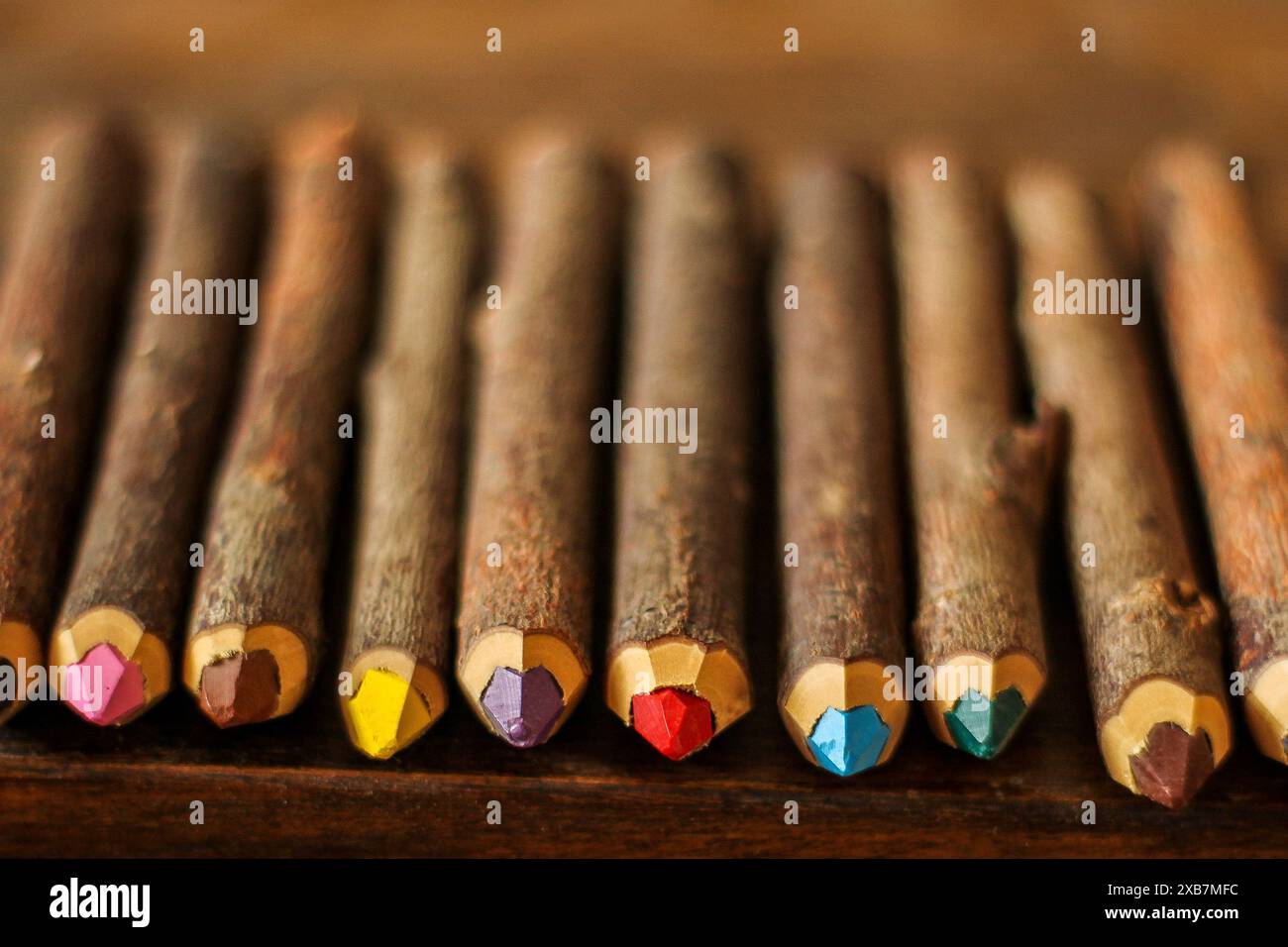 The color pencils neatly arranged for display Stock Photo - Alamy