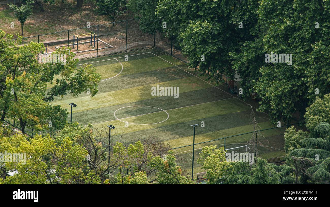 A sunlit small football field in Wuhan's community forest Stock Photo ...
