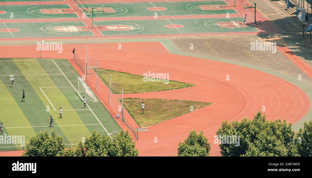 University students jumping on campus hi-res stock photography and ...