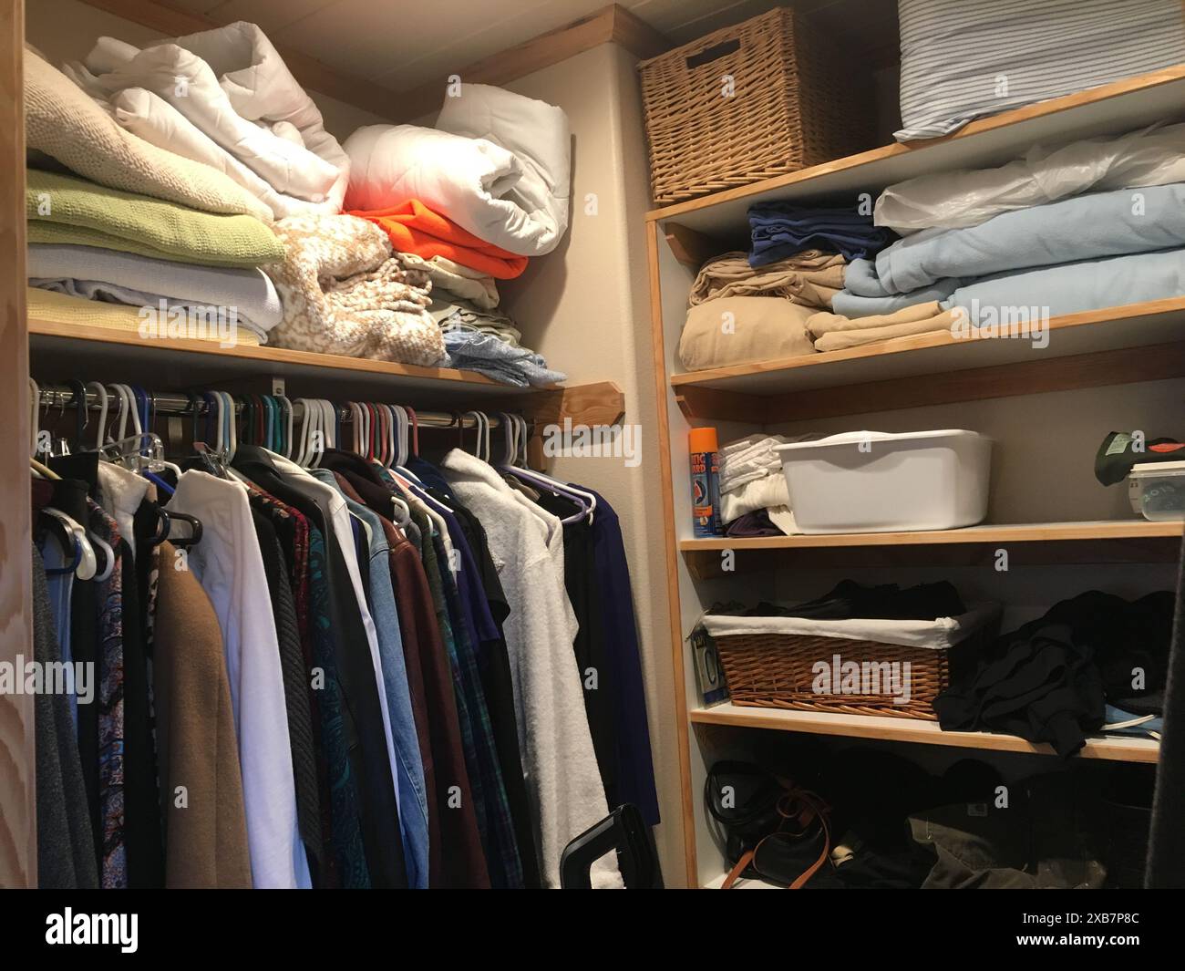 wardrobe filled with numerous shirts and drawers Stock Photo - Alamy