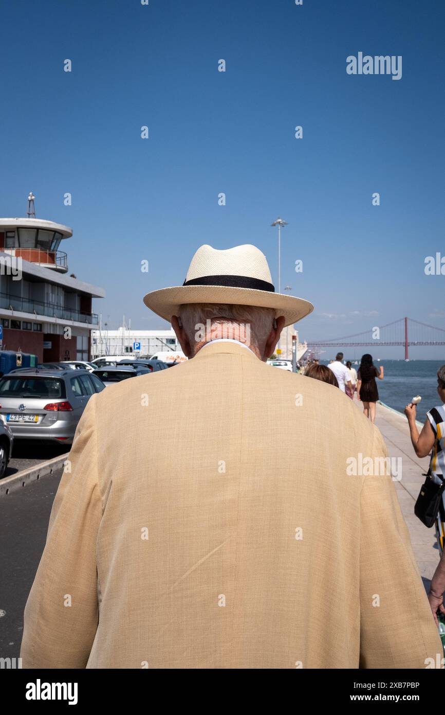 Older person with a hat in the Belem district of Lisbon, capital of ...