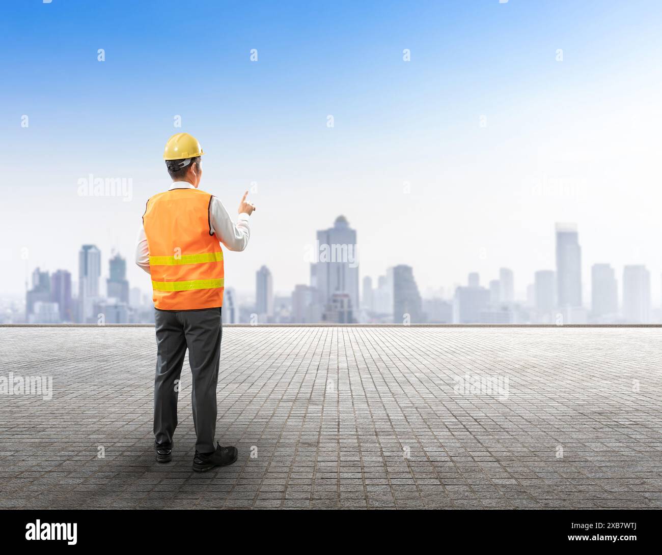 Construction business concept with rear view civil engineer finger ...