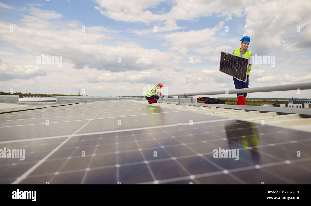 Construction workers installing solar hi-res stock photography and ...