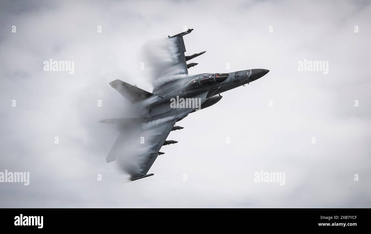 Capt. Alex L. Hampton, from Chicago, commander, Carrier Air Wing 7 ...