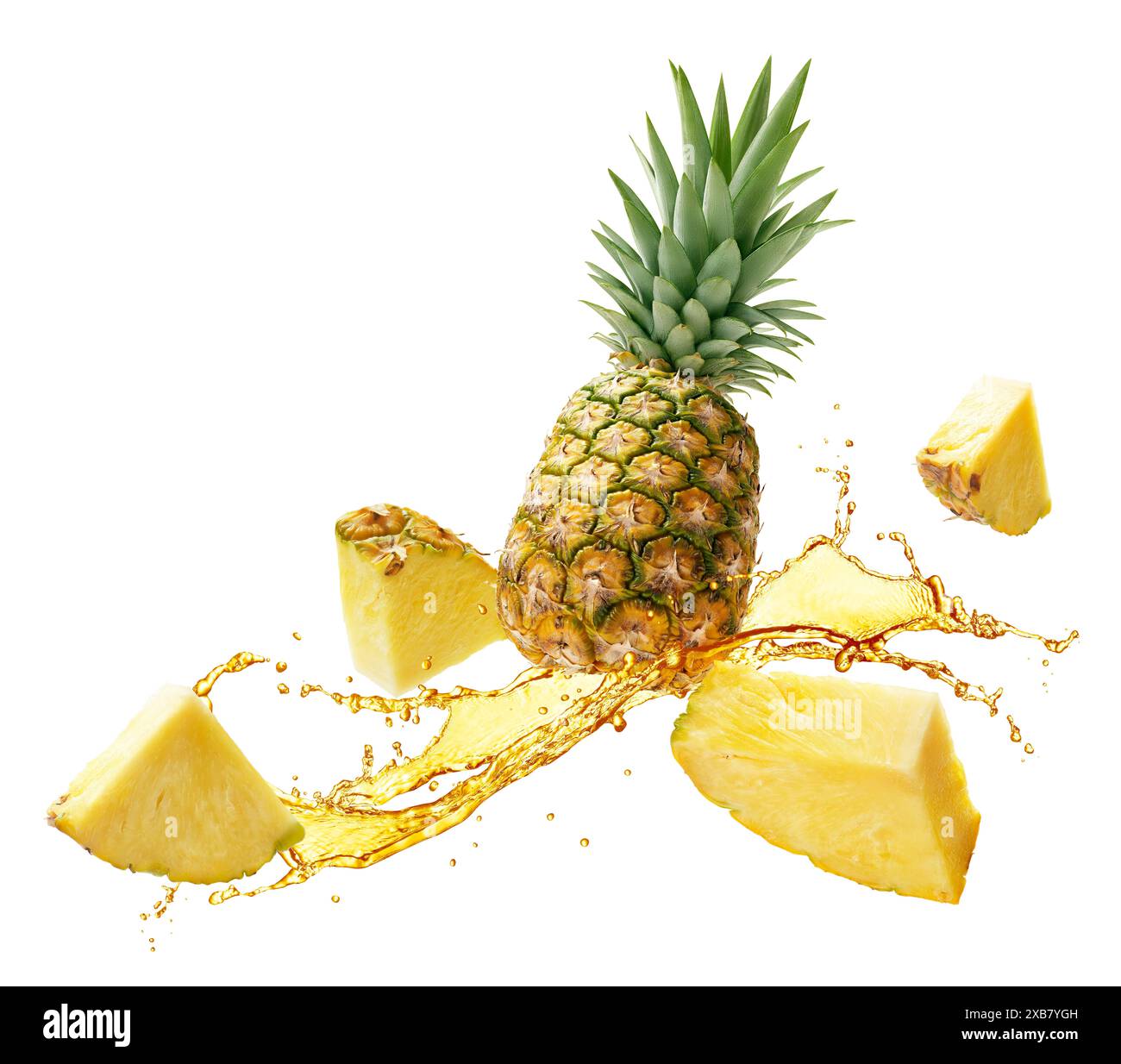 Pineapple juice splashing with its fruit over white background Stock ...