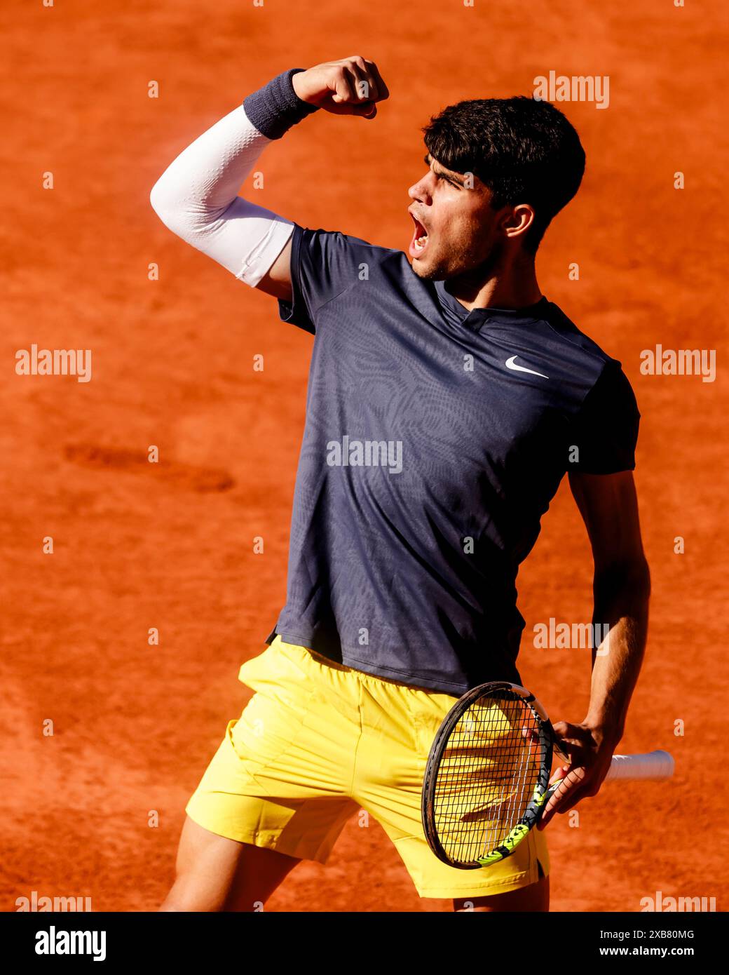 Tennis player Carlos Alcaraz from Spain is in action during the men’s ...