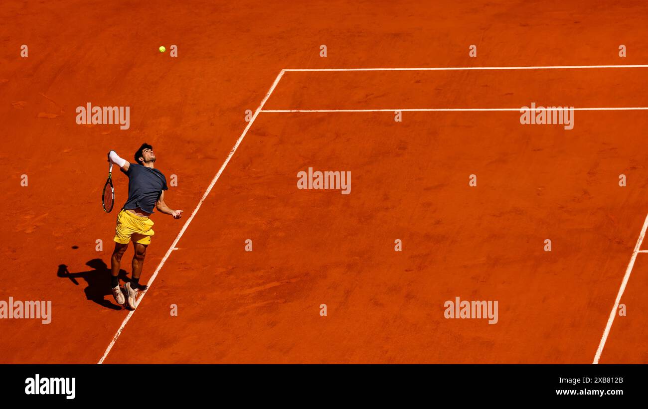 Tennis player Carlos Alcaraz from Spain is in action during the men’s ...