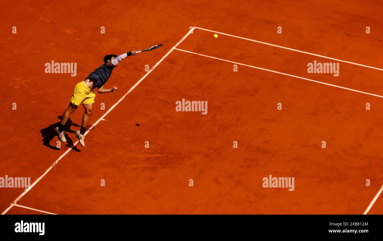Tennis player Carlos Alcaraz from Spain is in action during the men’s ...
